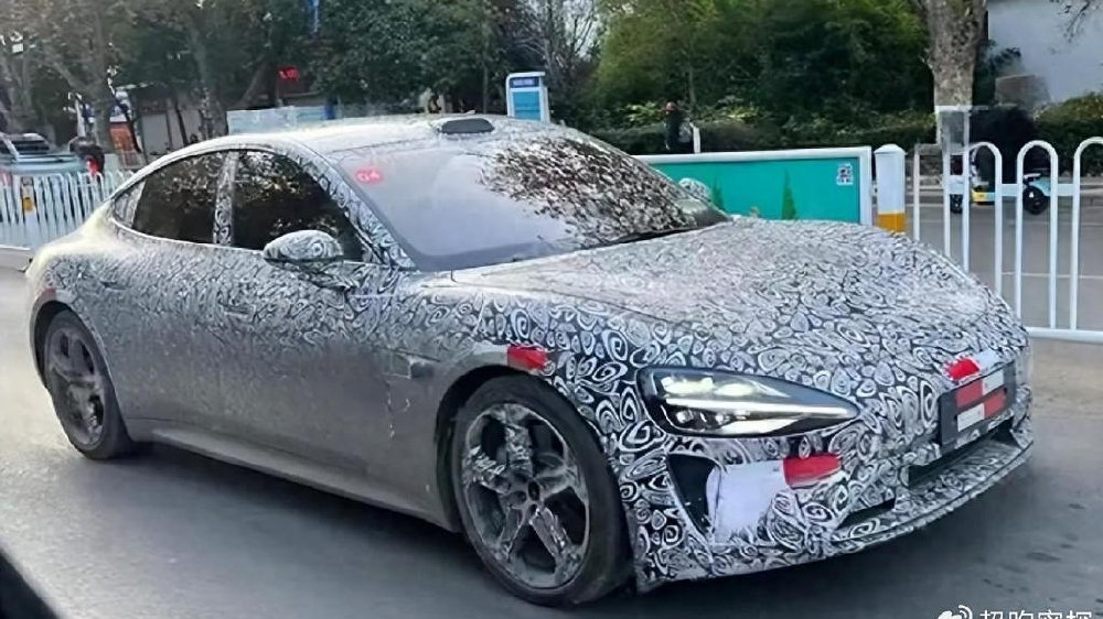 还是蛮漂亮的,小米su7伪装车曝光 新浪汽车