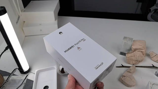 华为Pura70 Pro 罗兰紫快速开箱分享_新浪新闻