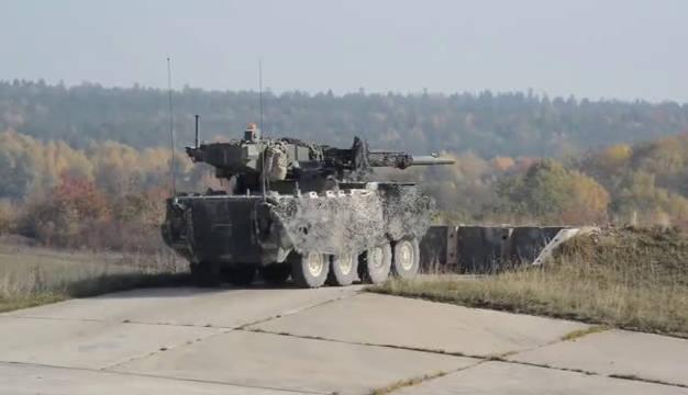 美军斯崔克105毫米轮式突击炮_新浪新闻