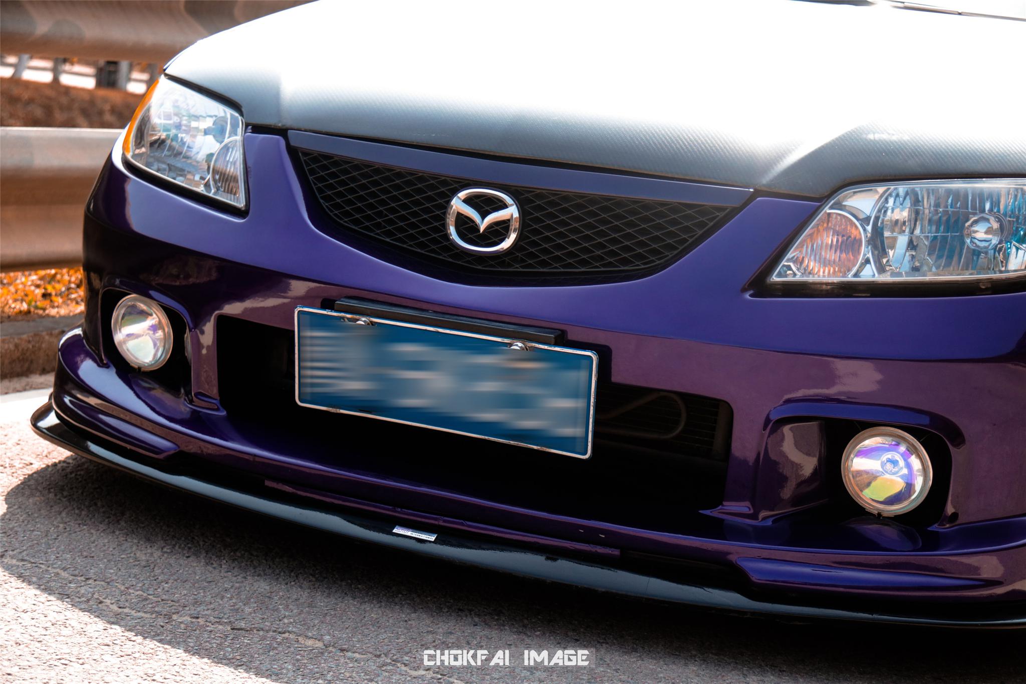 亲手将爱车打造成姿态大王，战斗格的马自达323真是帅气十足！-新浪汽车