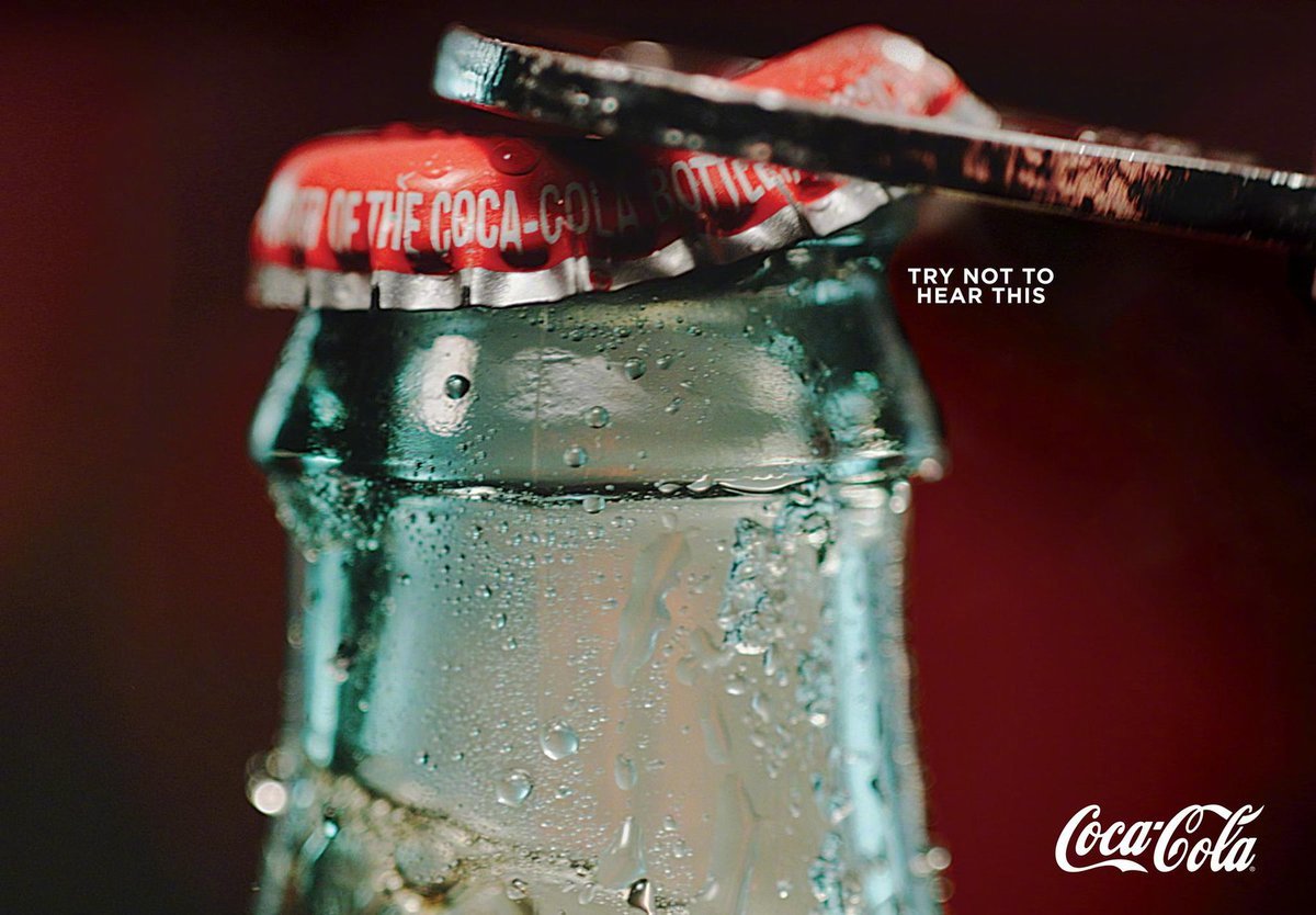 可口可乐创意广告，在看海报的时候仿佛听见了开启瓶盖时的声音|可口可乐|瓶盖|平面类_新浪新闻