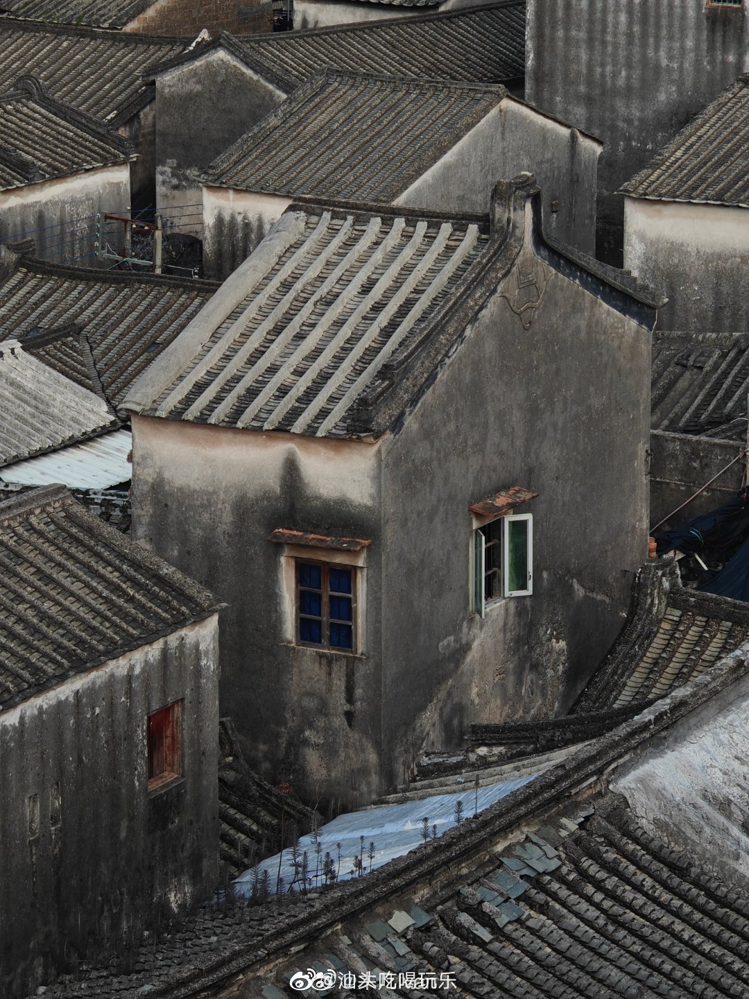用手机长焦看潮汕老厝建筑群貌__财经头条