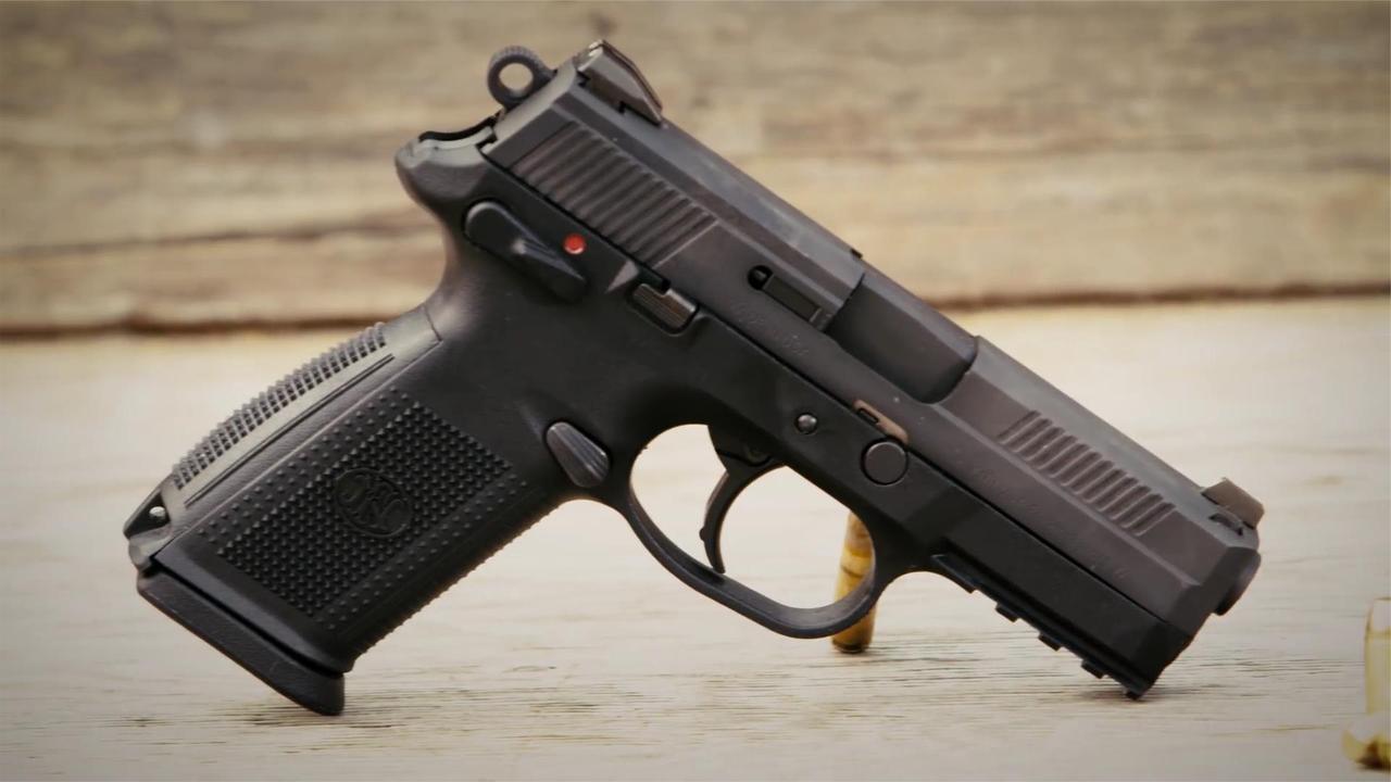 它的问世不仅丰富了选择 也展示了FN公司在枪械领域的引领地位_新浪新闻