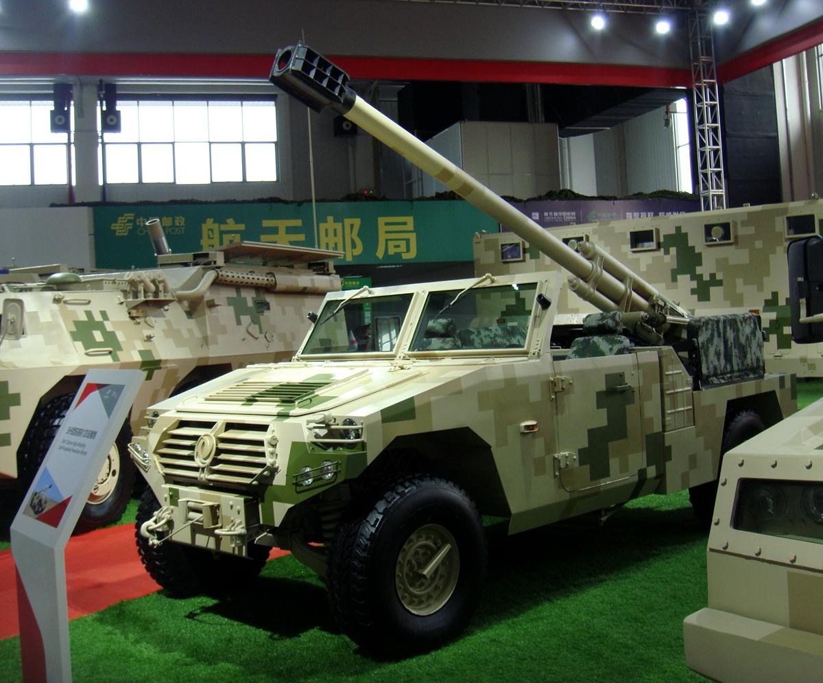 小车拉大炮：我军的SH9轻高机120迫榴炮_手机新浪网